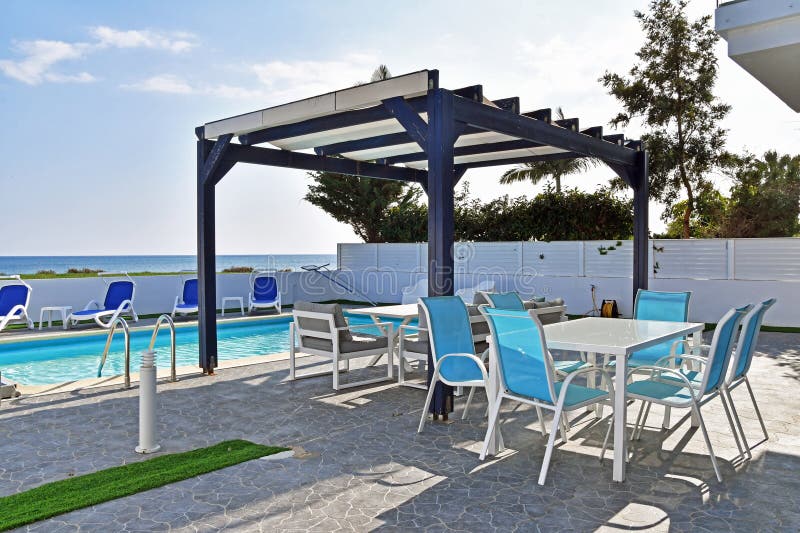 Swimming Pool with Sea View Stock Photo - Image of table, furniture ...