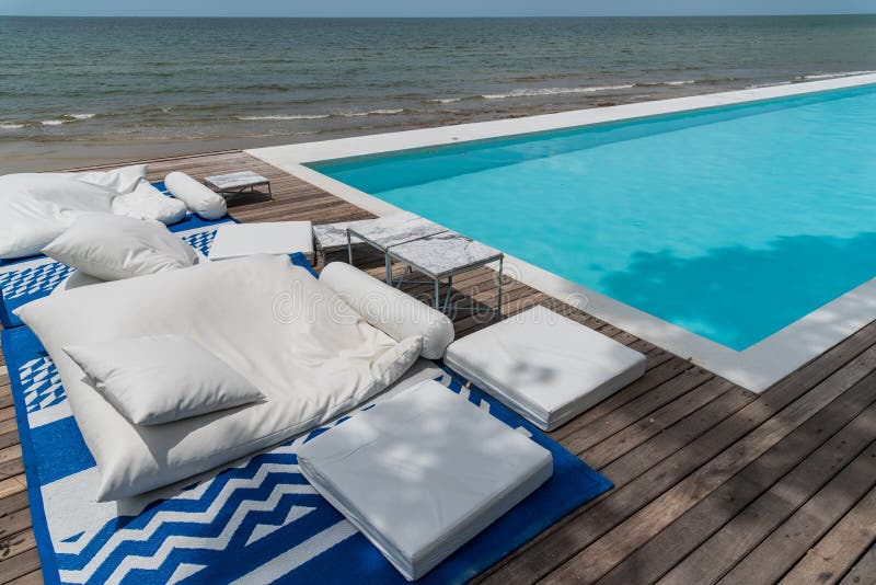 Swimming pool sofa stock image. Image of relax, travel - 106497477