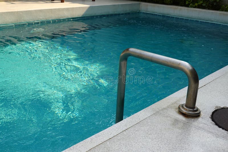 Swimming Pool with Stainless Handrails at Resort Stock Photo - Image of ...