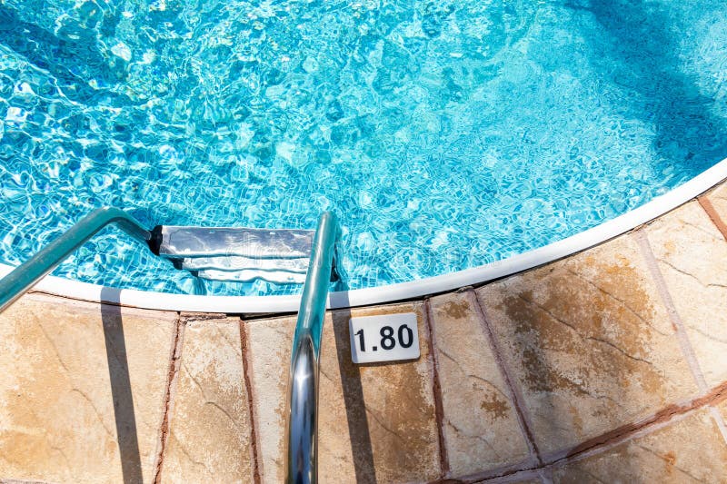 Swimming Pool Stairs with a Mark for the Depth of the Pool. Pool Safety ...