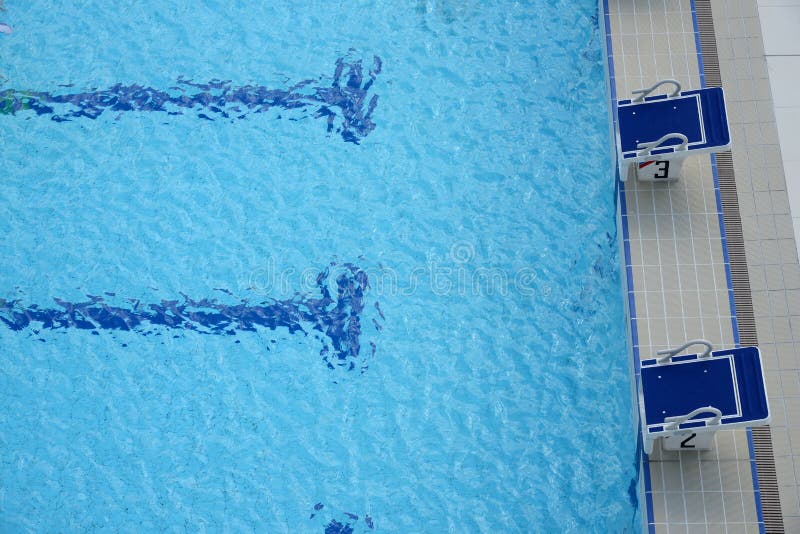 Swimming Pool Starting Blocks Stock Image - Image of masonry, ripple ...