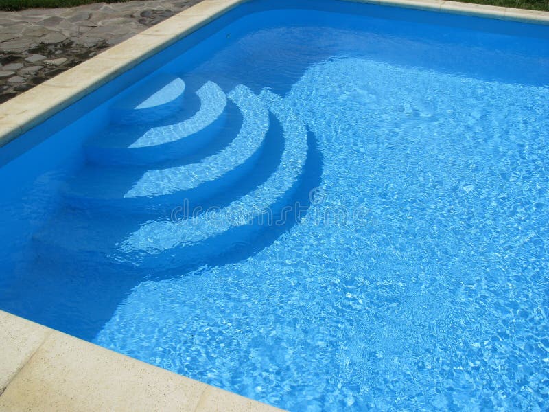 Swimming pool with steps stock image. Image of resort - 49977101
