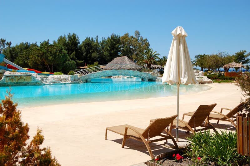 Sunbeds at Swimming Pool of Luxury Hotel Stock Image - Image of sunbed ...