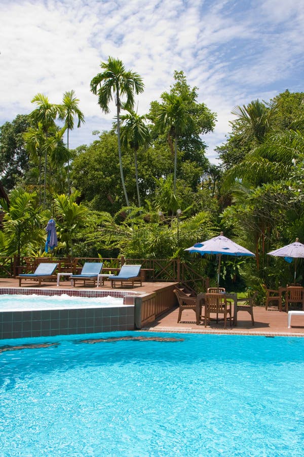 Swimming Pool on a Sunny Day. Stock Image - Image of beach, blue: 11388577