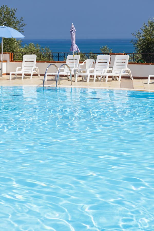 Swimming Pool on Sunny Day by Sea Stock Image - Image of clear ...