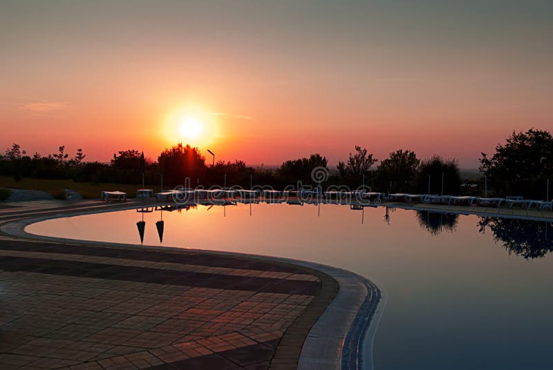 Swimming pool in sunrise stock image. Image of party - 32272417