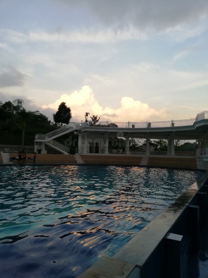 Swimming Pool with Sunset Views Stock Image - Image of reflection ...