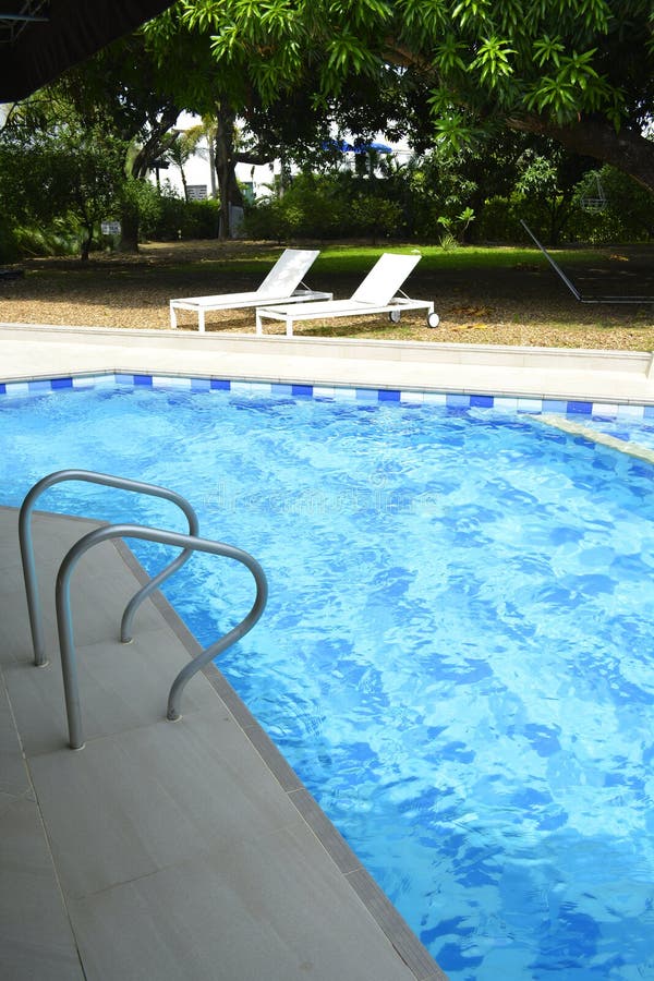 Swimming Pool with Topical Tree Stock Photo - Image of mexico, blue ...