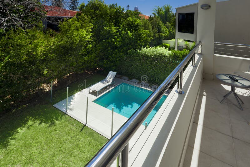 Swimming Pool View from Balcony Stock Photo - Image of plant, stylish ...