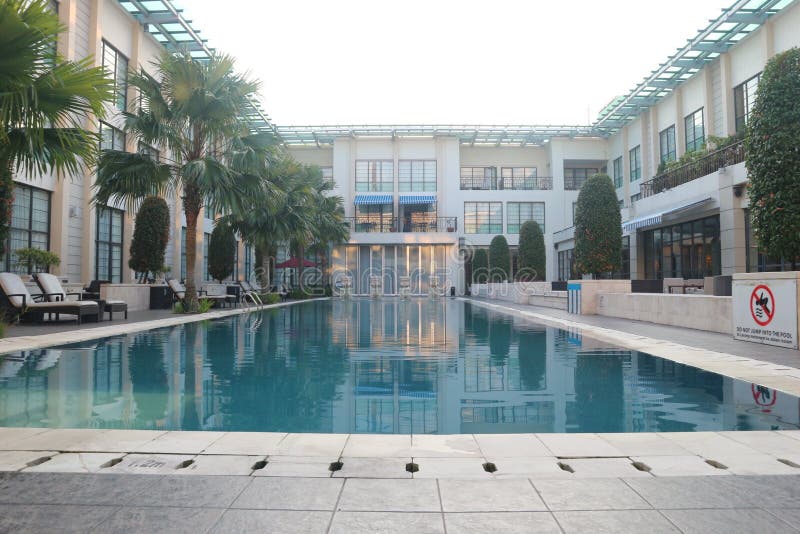 Swimming pool view editorial stock photo. Image of fountain - 229246083