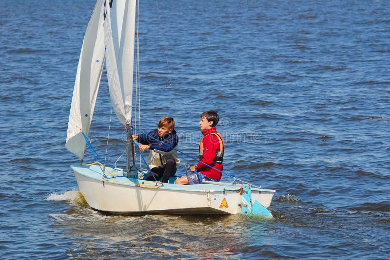 Swimming on sails. editorial image. Image of attempt - 230587540