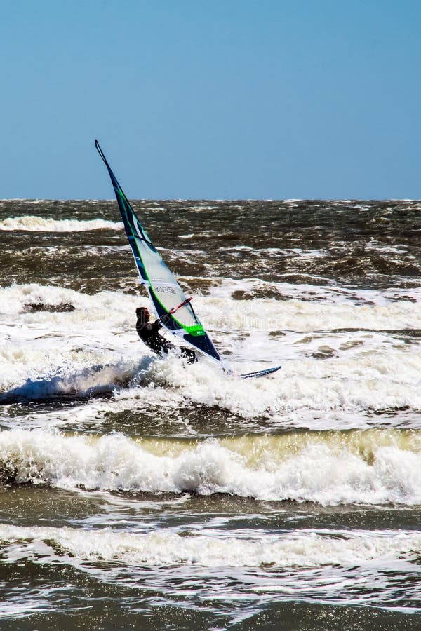 Swimming on sails. editorial image. Image of overcoming - 230590055