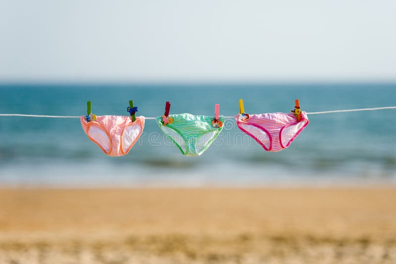 Swimming Wear Drying on the Line and Ocen Stock Image - Image of ...