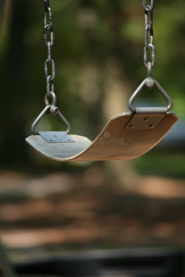 Swing stock image. Image of swingsets, lonely, grounds - 1262135