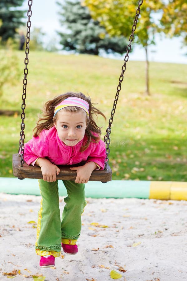 Swing stock image. Image of cheerful, caucasian, green - 27799189