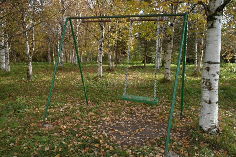 Swing in autumn Park. stock image. Image of park, fallen - 60250473