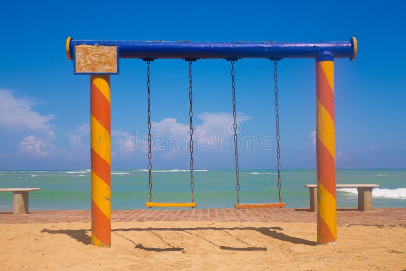 Swing on the beach stock photo. Image of outdoors, people - 60301422