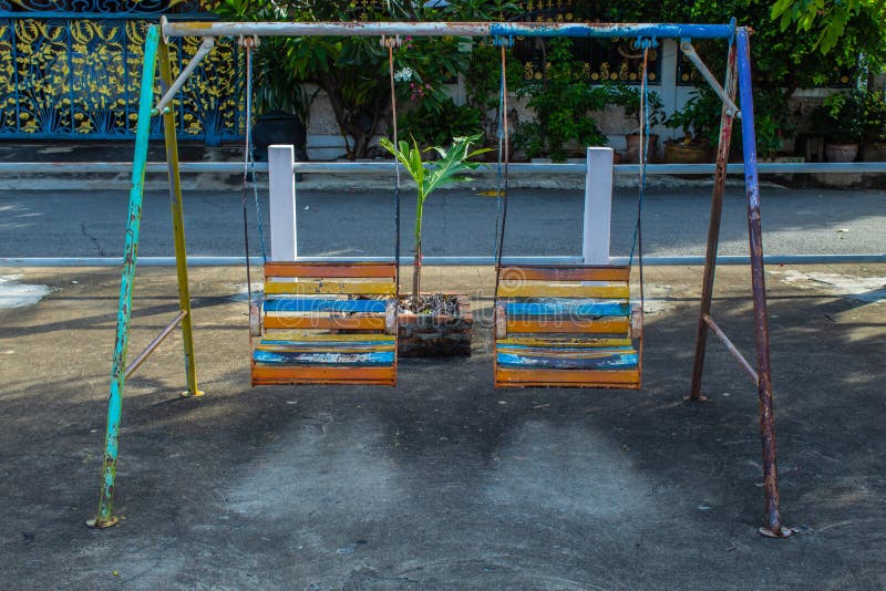 Swing Chairs for Children in Park. Stock Photo - Image of color ...