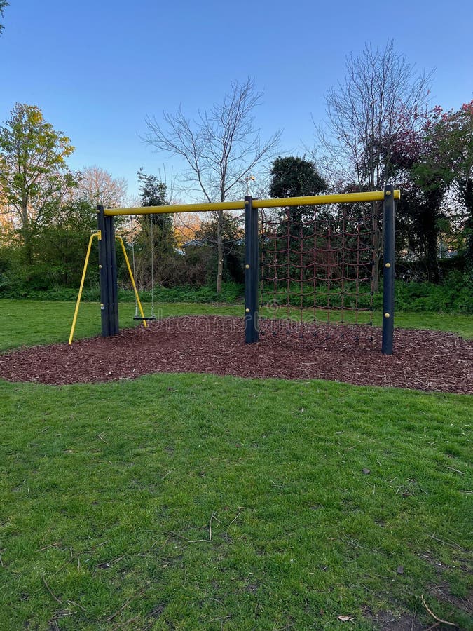 Swing and Climbing Net on Children`s Playground in Park Stock Image ...