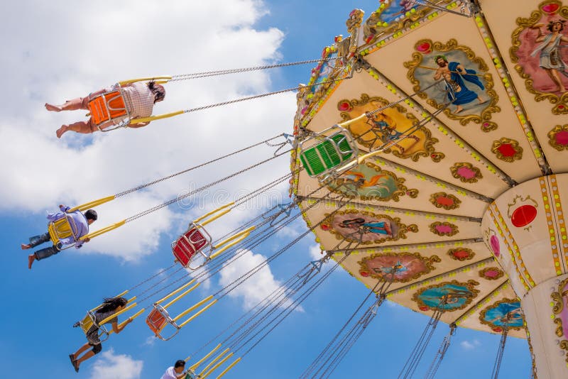 Flying Swing Carnival Rides at a Local Street Fair Editorial ...
