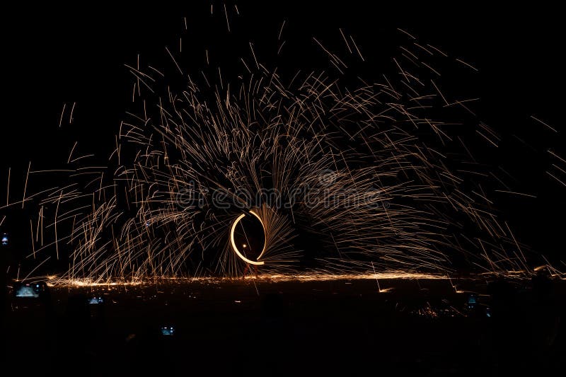 Swing Fire Dancing Show, Long Exposure on the Floor at the Night Time ...