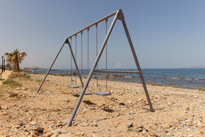 Swing on the Mediterranean Coast Stock Photo - Image of empty, activity ...