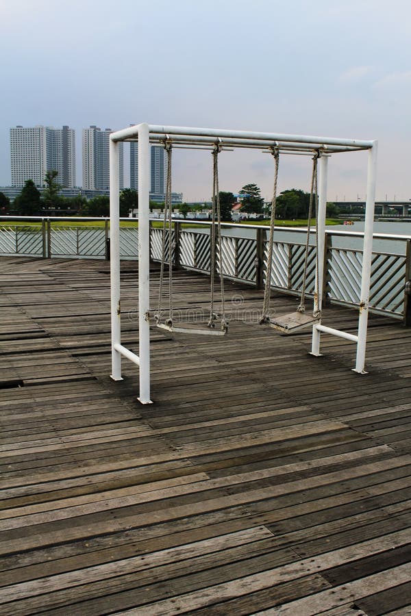 Swing in the Middle of the Bridge and in the Spacious Garden with a ...