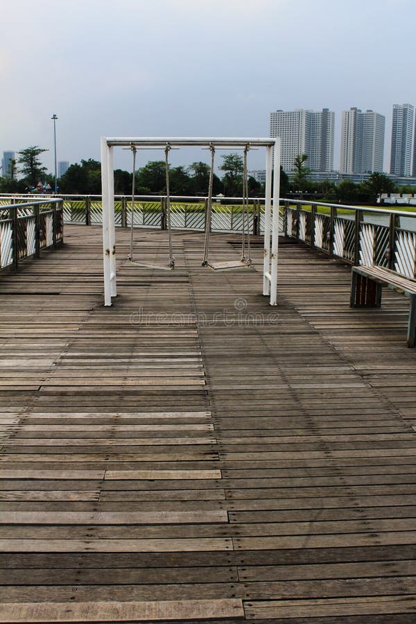 Swing in the Middle of the Bridge and in the Spacious Garden with a ...