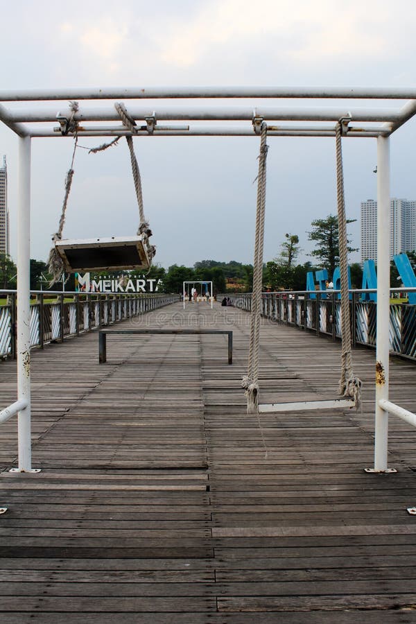 Swing in the Middle of the Bridge and in the Spacious Garden with a ...