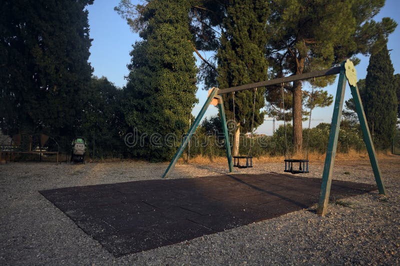 Swing in a playground stock image. Image of garden, peaceful - 341230919