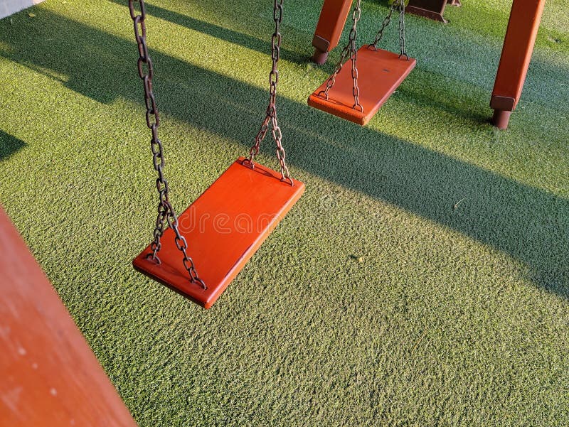 Swing Playground in the Morning Sunlight in Spring Stock Photo - Image ...