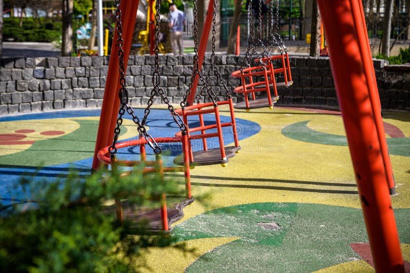 Swing on Playground, Set of Chain Swings on Modern Kids Playground ...