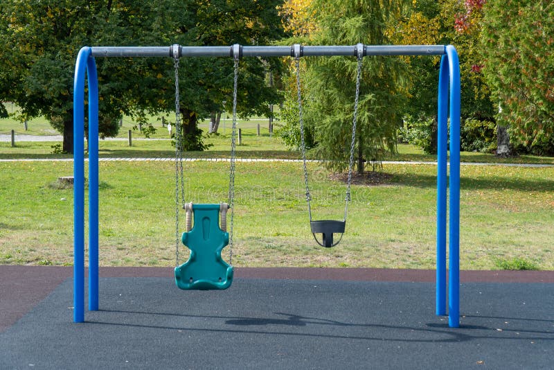 Empty Swing Set in Park on a Sunny Summer Day Stock Photo - Image of ...