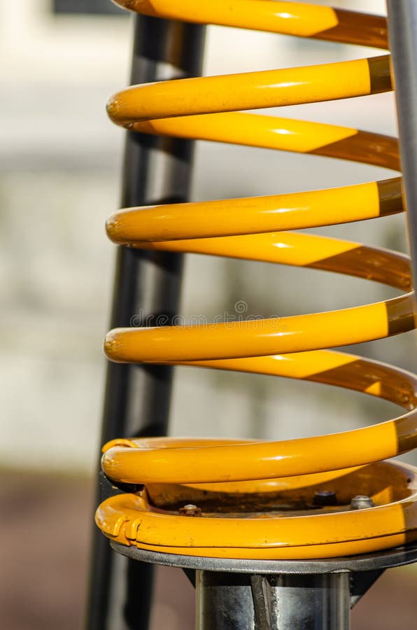 Swing Set Part a Close Up of a Coiled Spring Connecting the Swing Seat ...