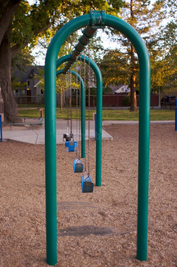 Swing Sets stock photo. Image of park, swing, chain, water - 9134424