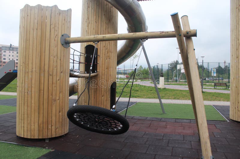 Swing Swinging.Playground in the Park Stock Image - Image of swing ...