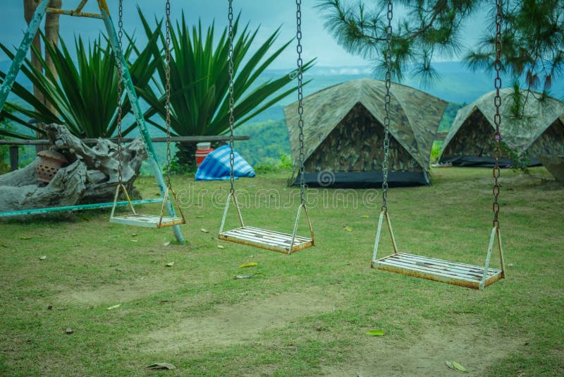 A Swing on Top of a Misty Mountain View at Viewpoint Stock Image ...