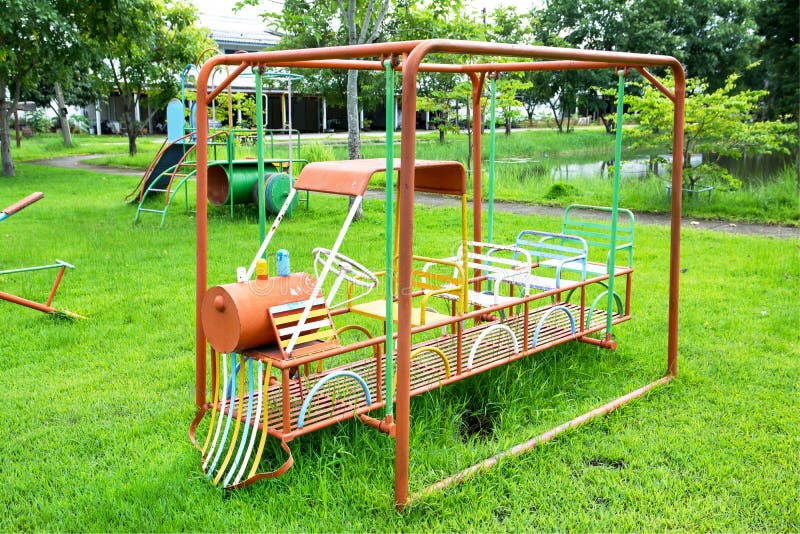 Swing Train at the Playground. Swing Metal Train at Playground with ...