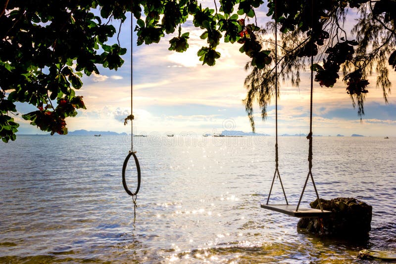 Swing Under the Sea, Bright Blue Sea. Stock Image - Image of happy ...