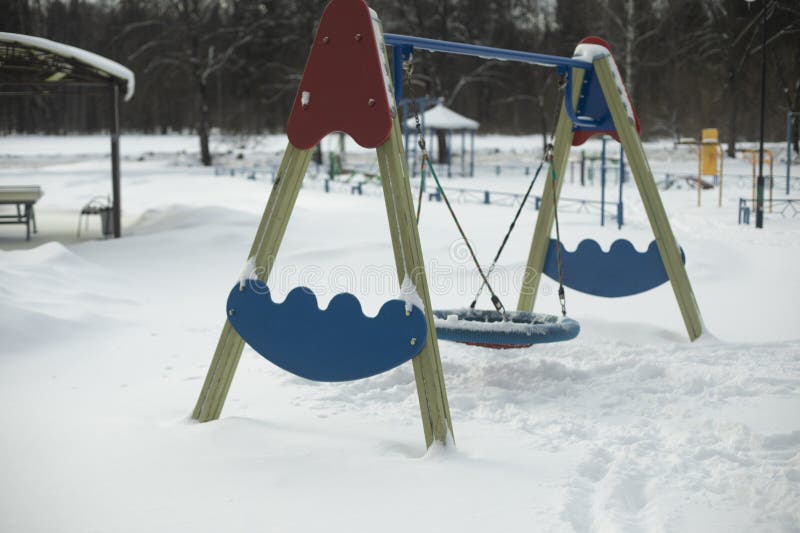 Swing in Winter. Playground in Winter Stock Photo - Image of winter ...