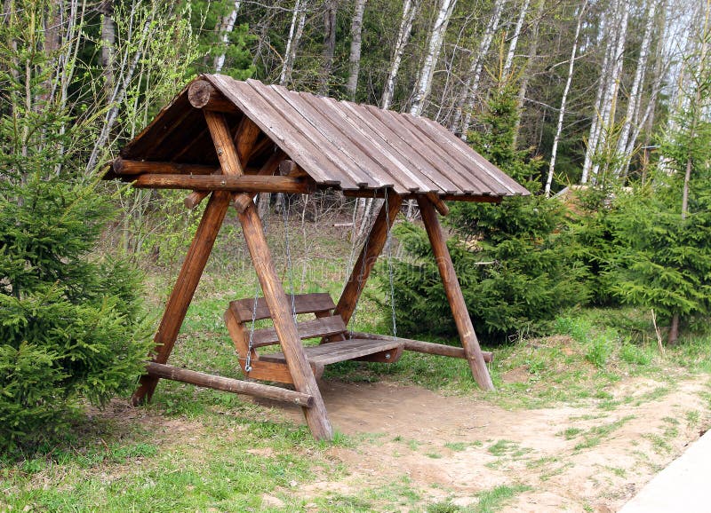 Swinging chain bench stock image. Image of green, recreation - 86080935