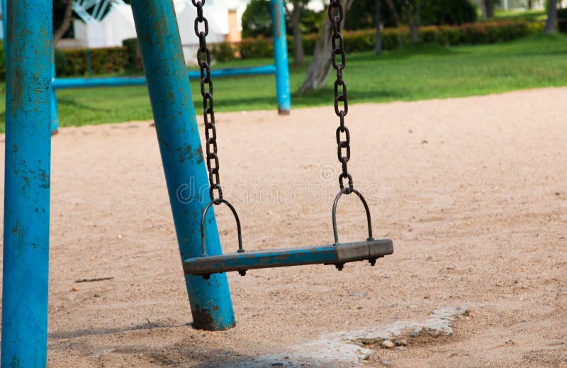 The Swings in the Playground Stock Photo - Image of lawn, kidnapping ...
