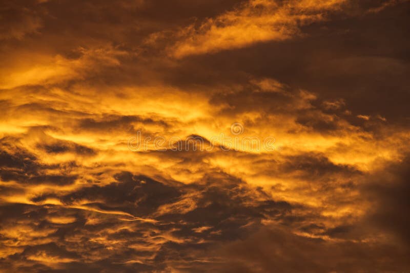 Swirling Evening Clouds Illuminated by the Setting Sun Stock Photo ...