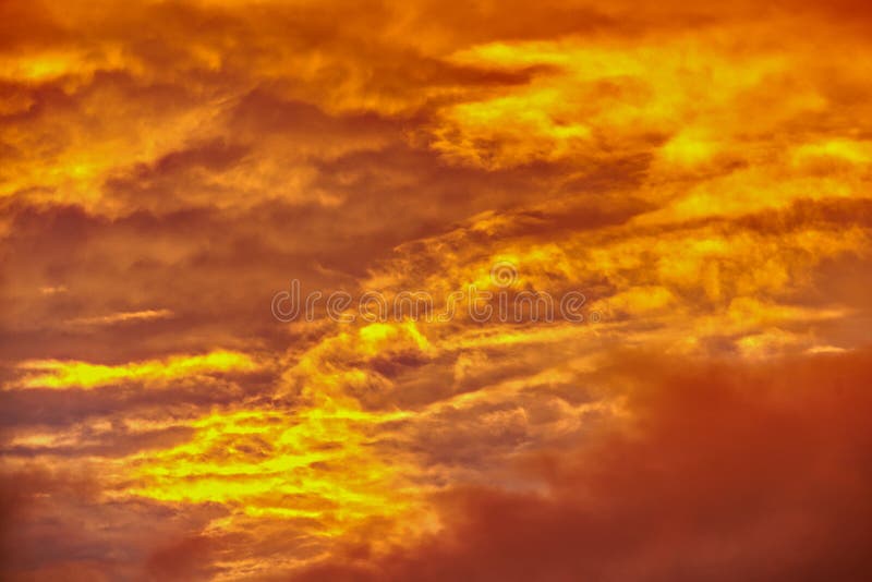 Swirling Evening Clouds Illuminated by the Setting Sun Stock Image ...