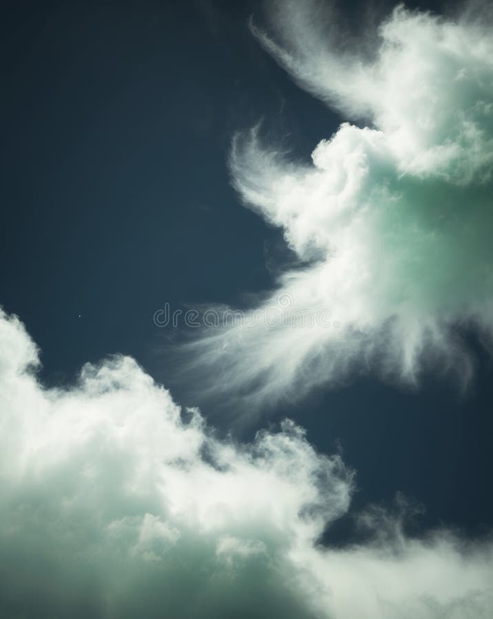 Swirling Green Clouds Illuminated by Soft Light during a Dramatic Night ...