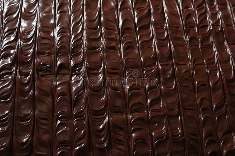 A Swirling Pattern a Sheet of Melted Chocolate Stock Image - Image of ...