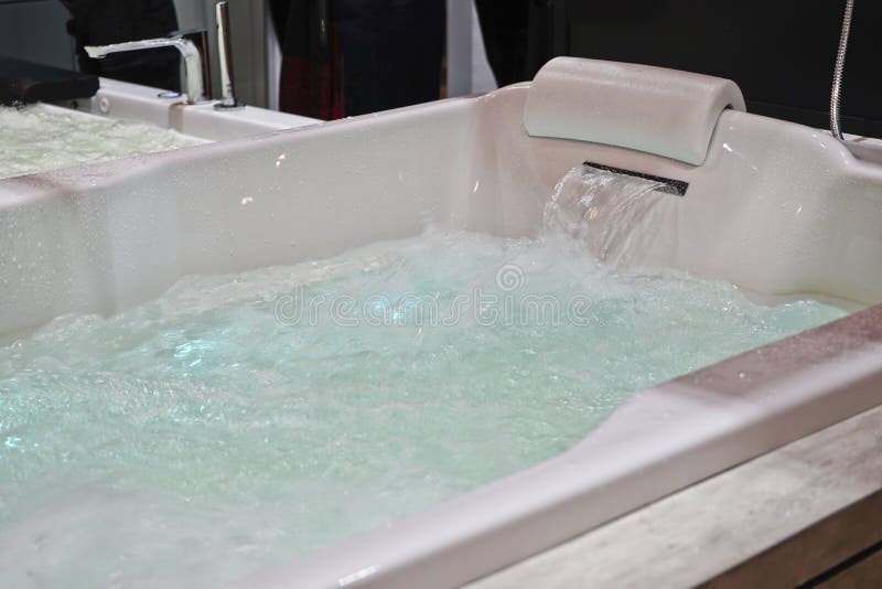 Swirling Water in Jacuzzi with in the Bathroom. Stock Photo - Image of ...