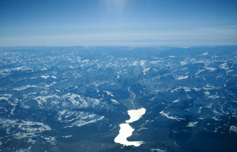 Swiss Alps from High Altitude Stock Photo - Image of lake, contrail ...