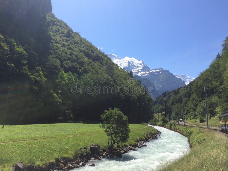 Swiss Alps River stock image. Image of stream, switzerland - 65494205
