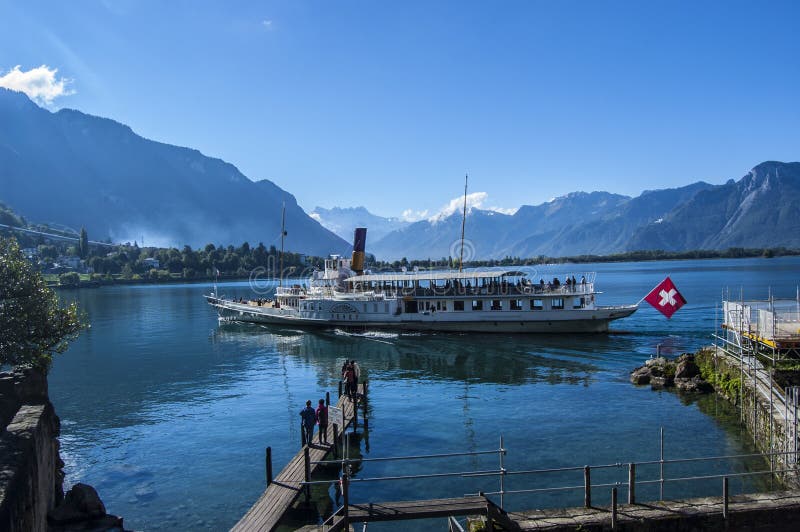 Swiss Boat ``Italie`` Close To the Shore with a Swan Eating Editorial ...